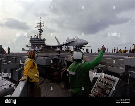 The Starboard Catapult Deckedge Operator Gives The First Ready Signal To The Catapult Officer