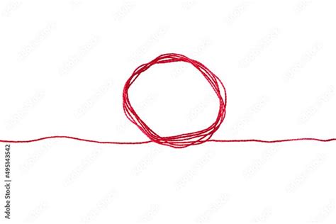 A Red Silk Thread Looped In A Circle Form Extending On Both Ends