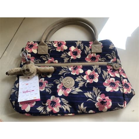กระเป๋า Kipling Sevrine มือ 1 ป้อยห้อยไม่มีถุง สายยาว ลายดอกน่ารักมา