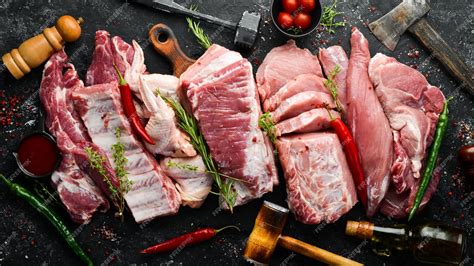 Premium Photo Raw Meat Background Meat On A Black Stone Background