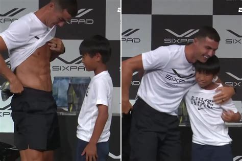 Cristiano Ronaldo Shows Off His Washboard Abs To Awestruck Young Fan At