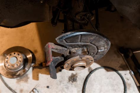 Detailed Close Up Of Automotive Brake System Components In A Workshop