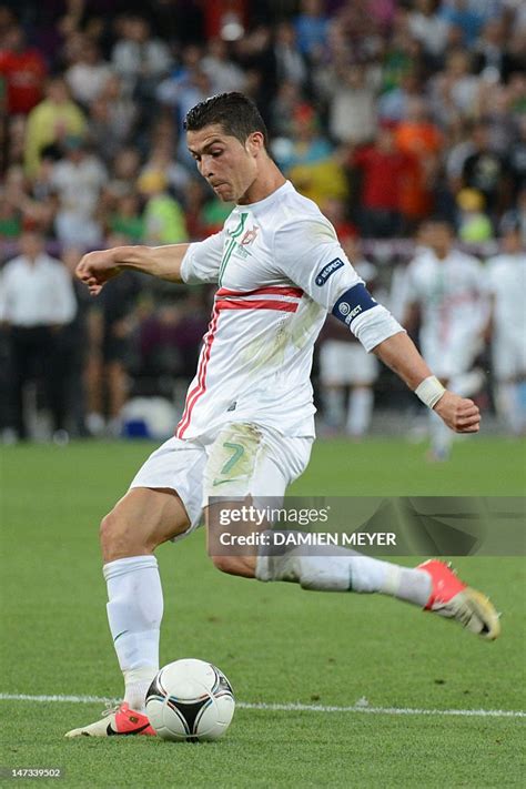 Portuguese Forward Cristiano Ronaldo Shoots A Free Kick During The