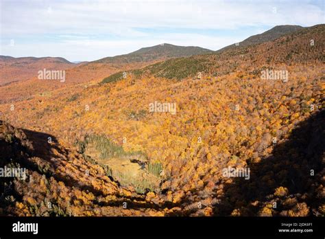 Panoramic View Of Peak Fall Foliage In Smugglers Notch Vermont Stock