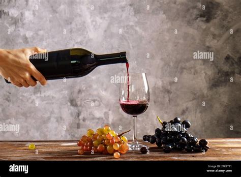 Hand Pouring Wine At Stephen Jamerson Blog