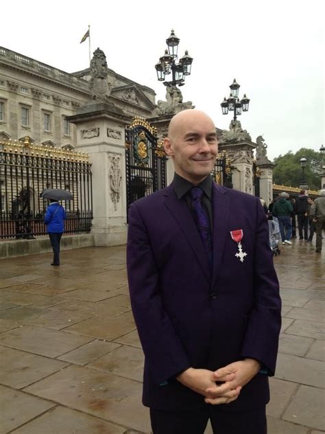 Grant Morrison Proudly Displays His Mbe
