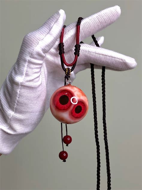 Polycoria Red Eyes Eye Pendant Lkbird