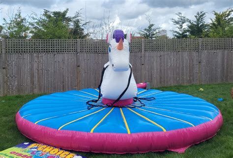 Rodeo Pull Unicorn Themed Inflatable Game 16ft Diameter Bouncy Castle