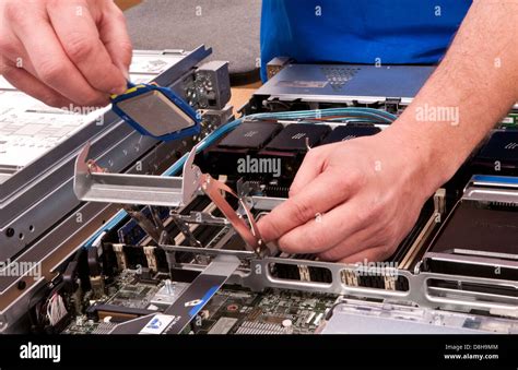 Close Up Of Technician Assembling Server For Computer It Company For