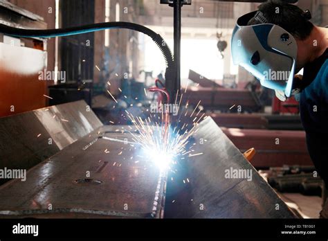 Worker And Cnc Machine Stock Photo Alamy