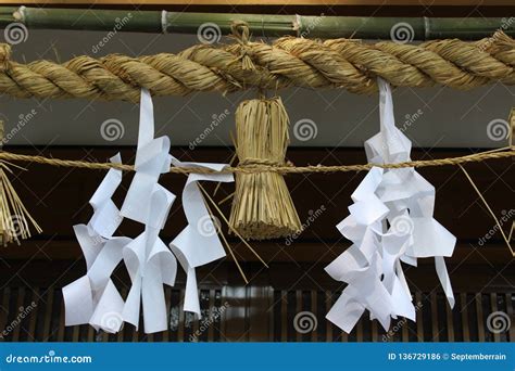 Shimenawa Rope And Zigzag Paper Decorations In Japanese Shide At