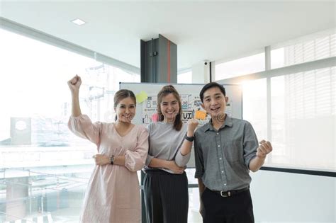 Asian Female Leader And Ux Ui Designer Clapping Hand For Successful Of Mobile App Interface