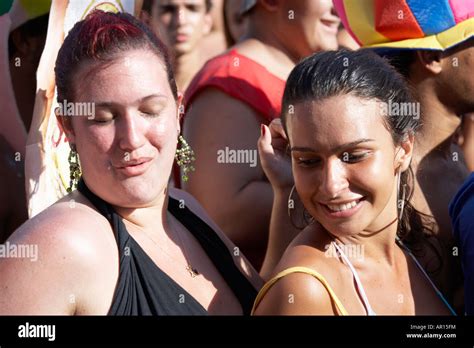 Two Girls Dancing At Street Carnival In Ipanema Rio De Janeiro Brazil