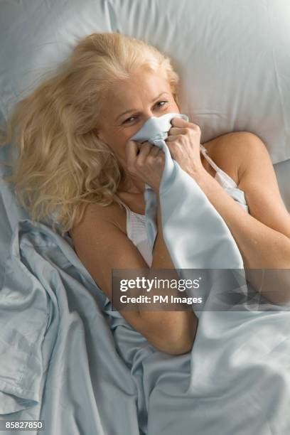 Shy Woman Bed Photos And Premium High Res Pictures Getty Images