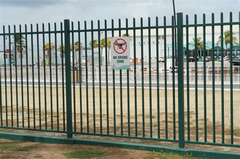 Sign With Silhouette Of Drone In Crossed Red Circle And Text No Drone Zone In Oranjestad Aruba