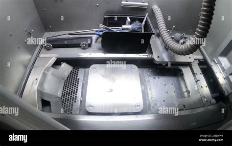 Empty Working Chamber Of 3d Printer For Metal Close Up Laser Sintering Machine For Metal