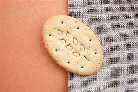 One Oval Multigrain Biscuits On Canvas Closeup Copy Space Stock Image Image Of Macro Oatmeal