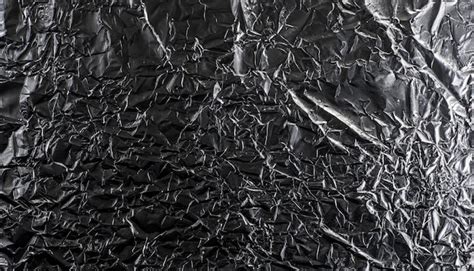 Premium Photo Black Foil Texture Metallic Background