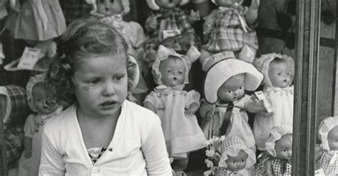 Girl In Front Of Doll Shop Window By Jim Steinhardt