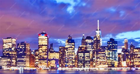 Premium Photo Blurred Color Toned Manhattan Skyline At Night New York