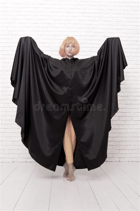 Dancing In Cloak Girl With Long Fit Legs In Orange Tights Dancing