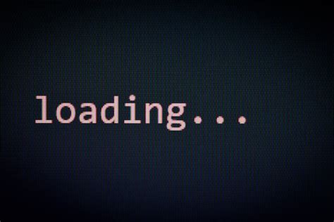 premium photo loading message on display screen black background data