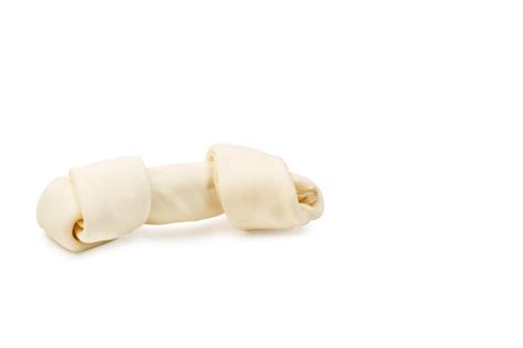 Premium Photo Rawhide Bone On A White Background With Copy Space