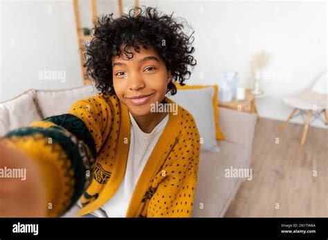 Happy African American Teen Girl Blogger Smiling Face Talking To Webcam Recording Vlog Social