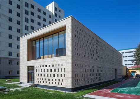 Canteen By Knowspace Features A Granite Facade Like Lychee Skin