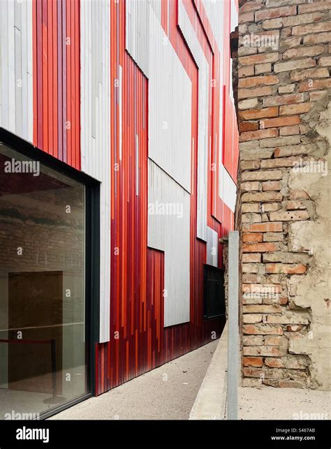 Reused Red And White Facade Cladding On The National Slovak Gallery In