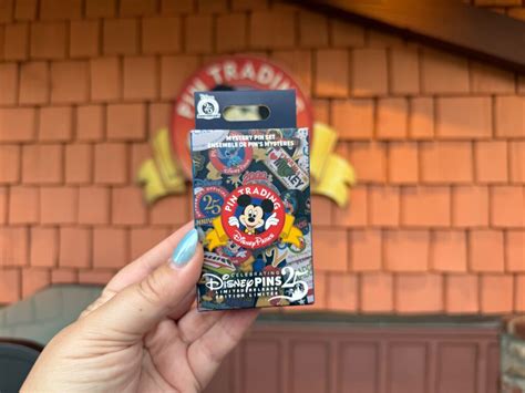 New 25th Anniversary Disney Pin Trading Mystery Pack Arrives In Disney Springs