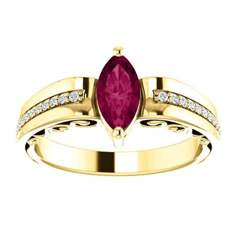 10kt Yellow Gold Marquise Garnet And Diamond Engagement Ring