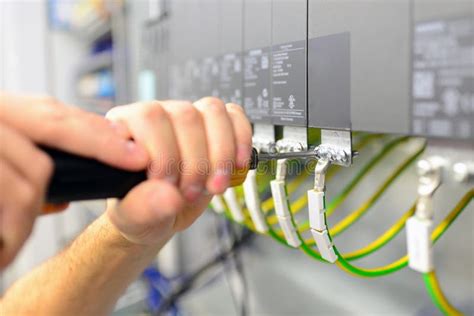 Assembly Components And Cables In A Factory In A Control Cabinet