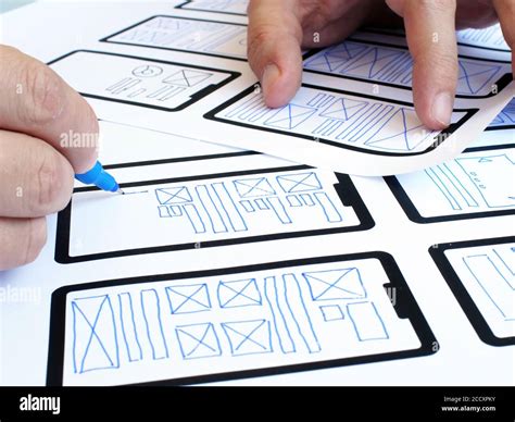 The Ux Ui Designer Develops The Design Of A Mobile Application Stock