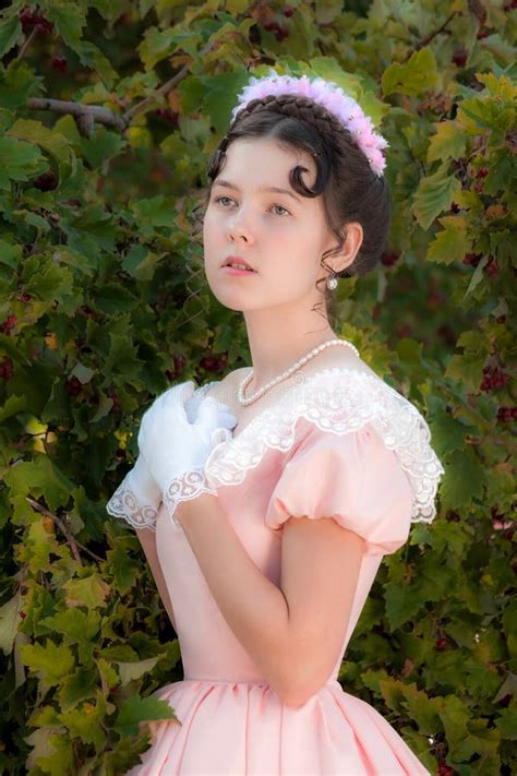 Romantic Innocent Girl Is Looking Into The Distance With Hope An Stock