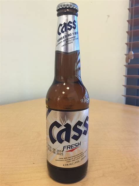 Cass Beer Bottle On Wooden Table