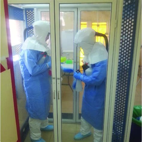 A Operators Dressed In Bsl3 Ppe Processing Clinical Specimens From