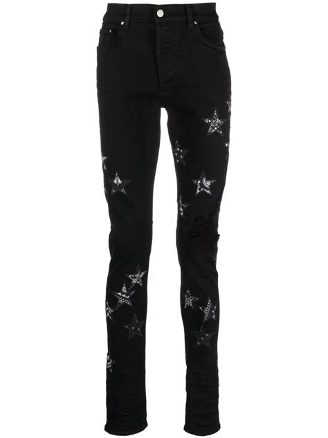 Amiri Star Patch Skinny Jeans In Black Modesens