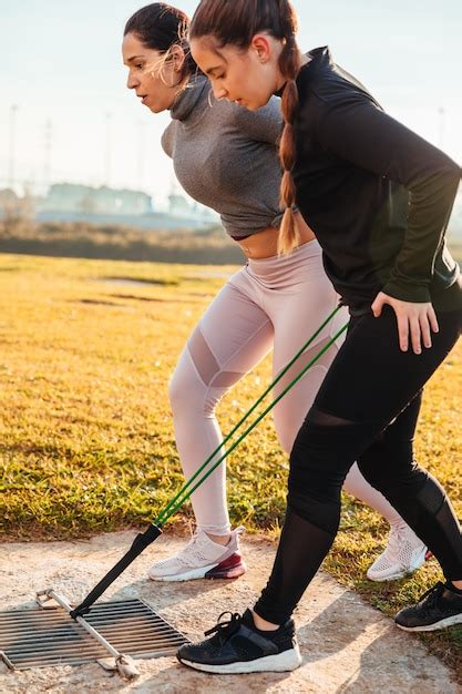 Premium Photo Two Girls Training Outdoors