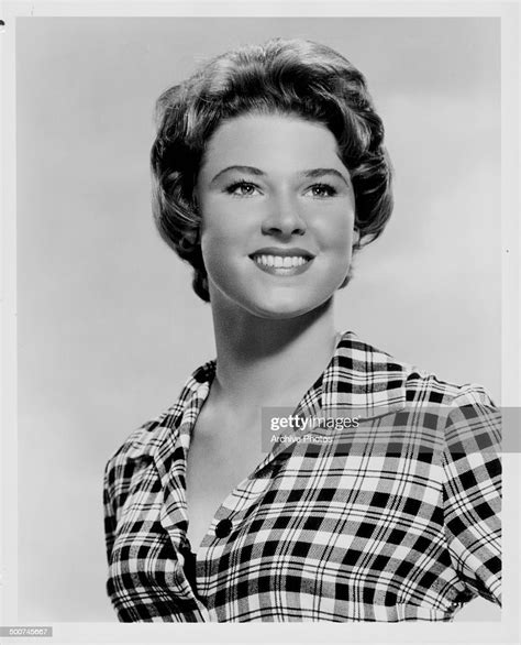 Headshot Of Actress Mariette Hartley Wearing A Gingham Blouse As She